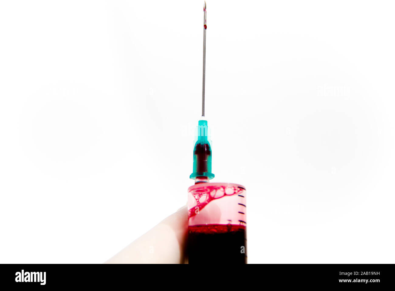 Photo of the Syringe in laboratory environment, blood and medical ...