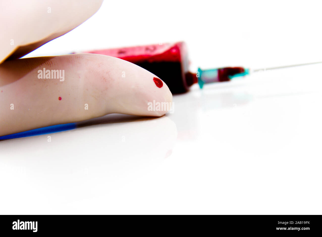 Photo of the Syringe in laboratory environment, blood and medical ...