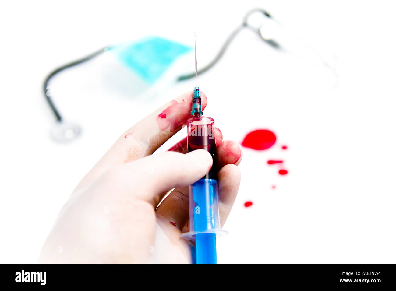 Photo of the Syringe in laboratory environment, blood and medical ...