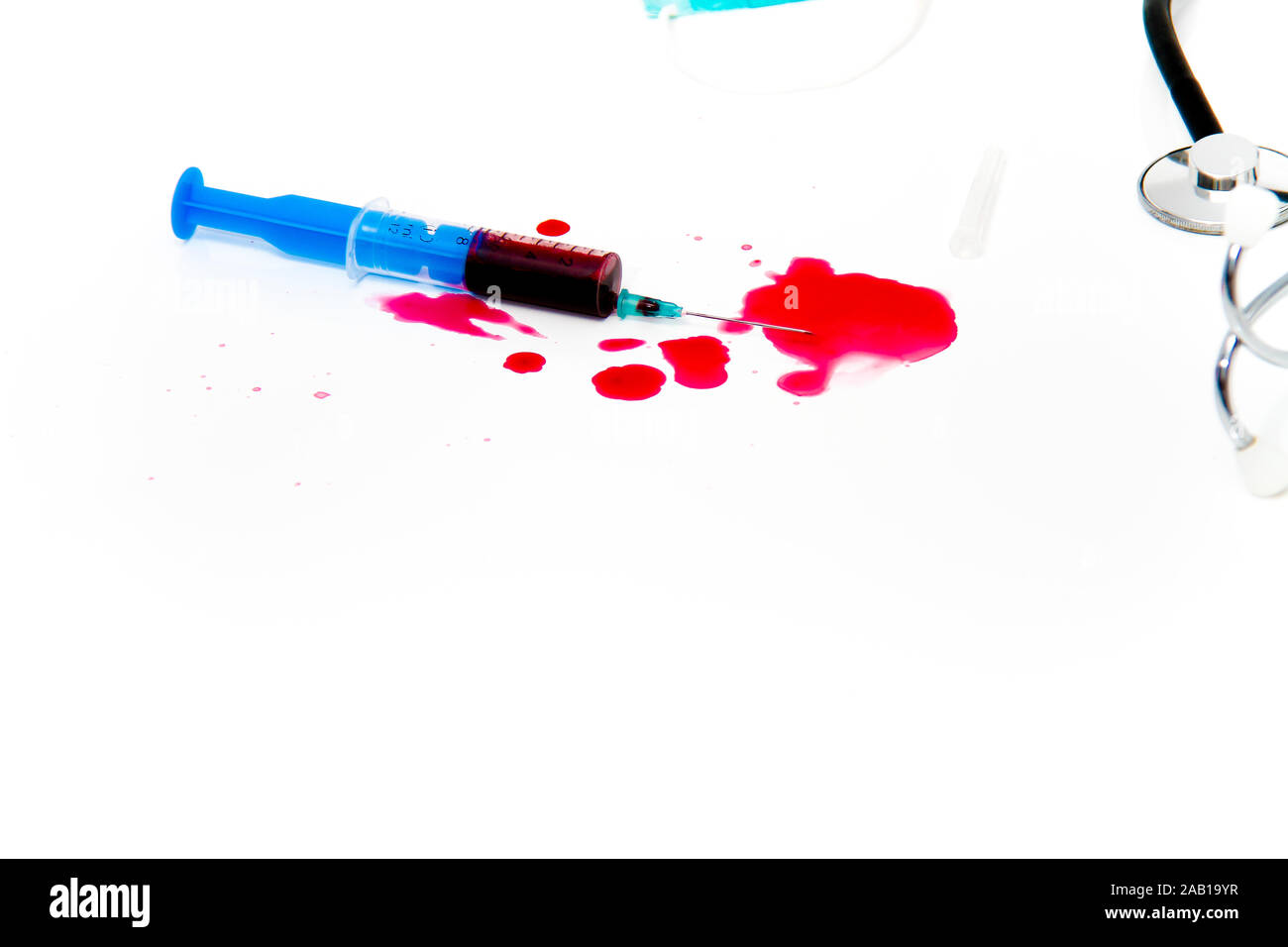 Photo of the Syringe in laboratory environment, blood and medical ...