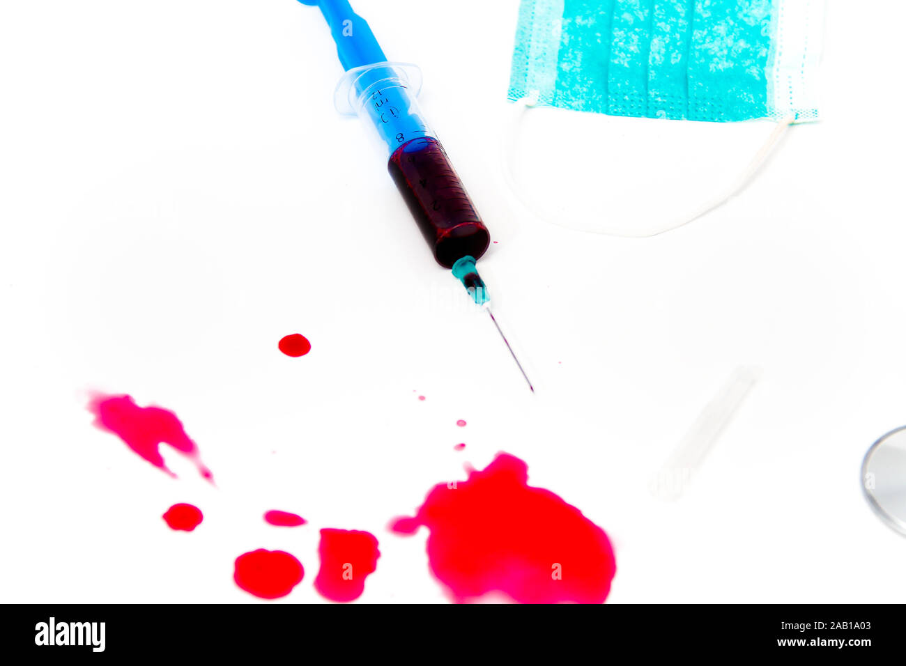 Photo of the Syringe in laboratory environment, blood and medical ...