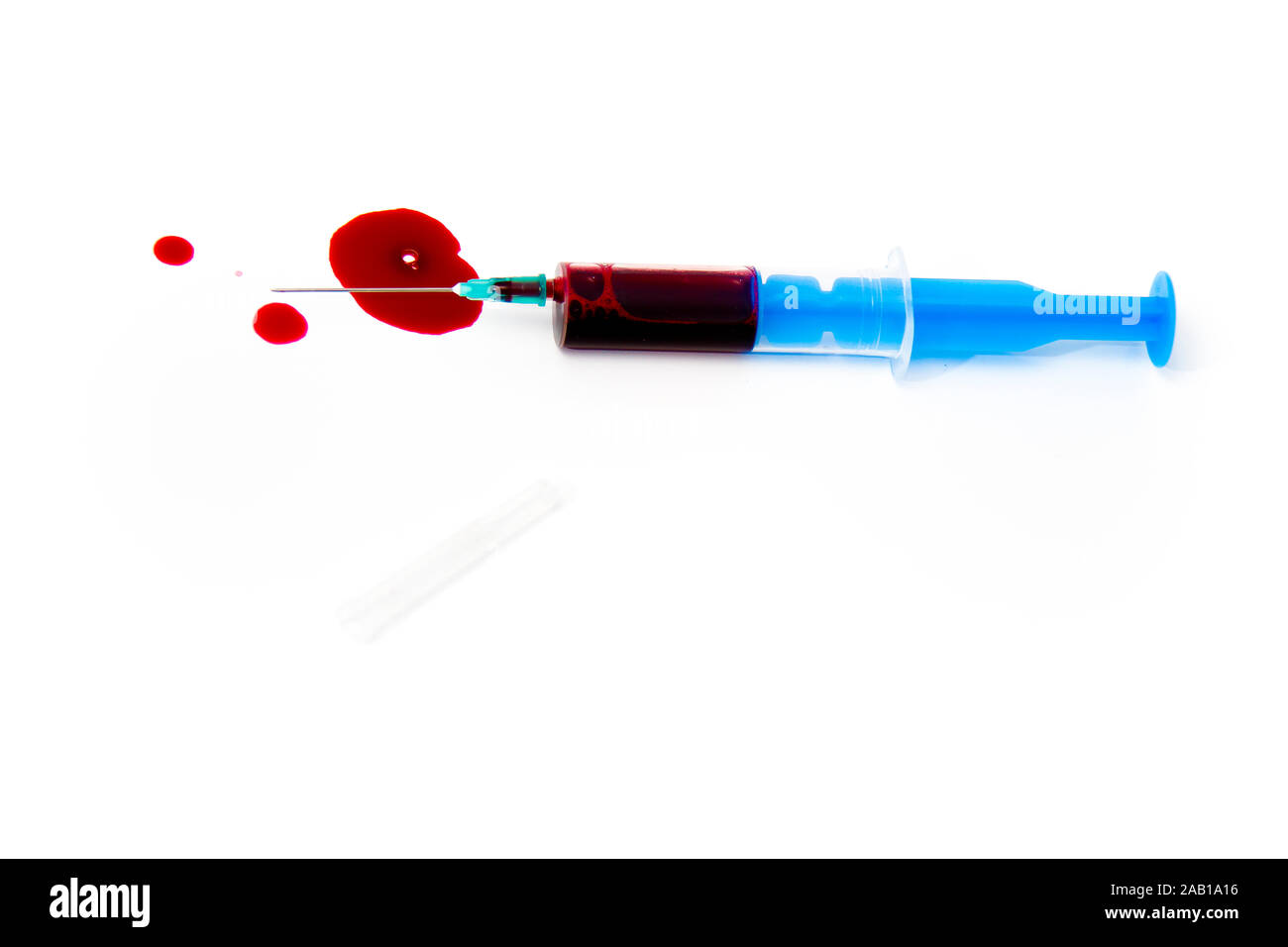 Photo of the Syringe in laboratory environment, blood and medical ...