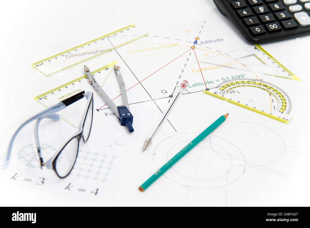 Photo of the Business Architectural project, pair of compasses, glasses ...
