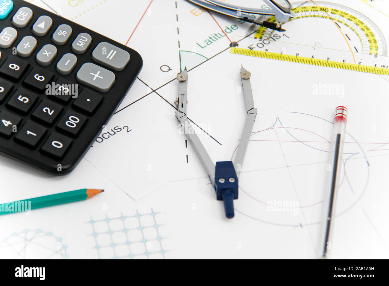 Photo of the Business Architectural project, pair of compasses, glasses ...