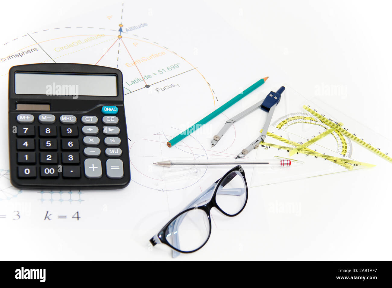 Photo of the Business Architectural project, pair of compasses, glasses ...