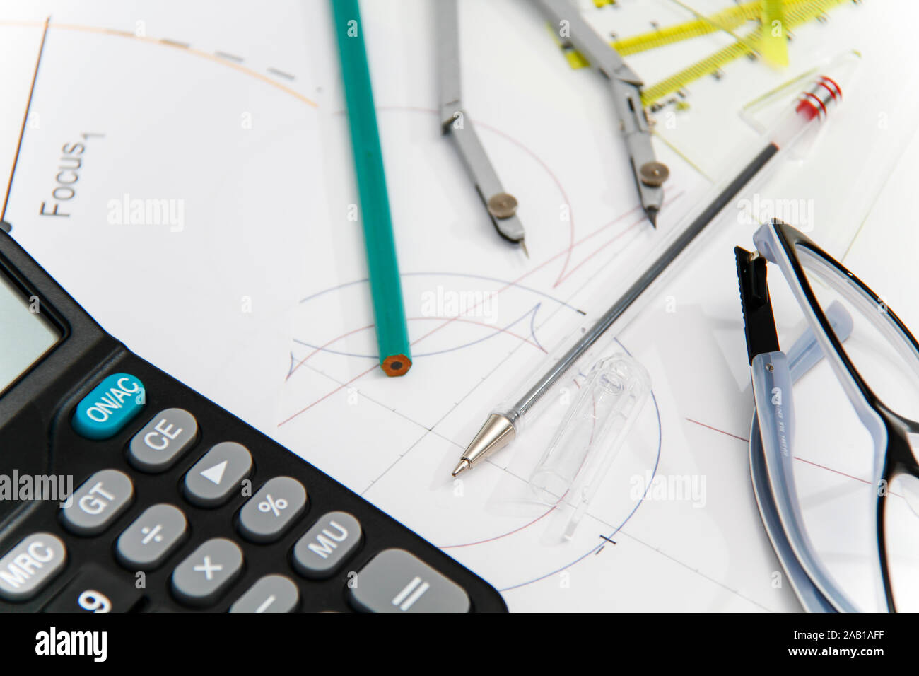 Photo of the Business Architectural project, pair of compasses, glasses ...