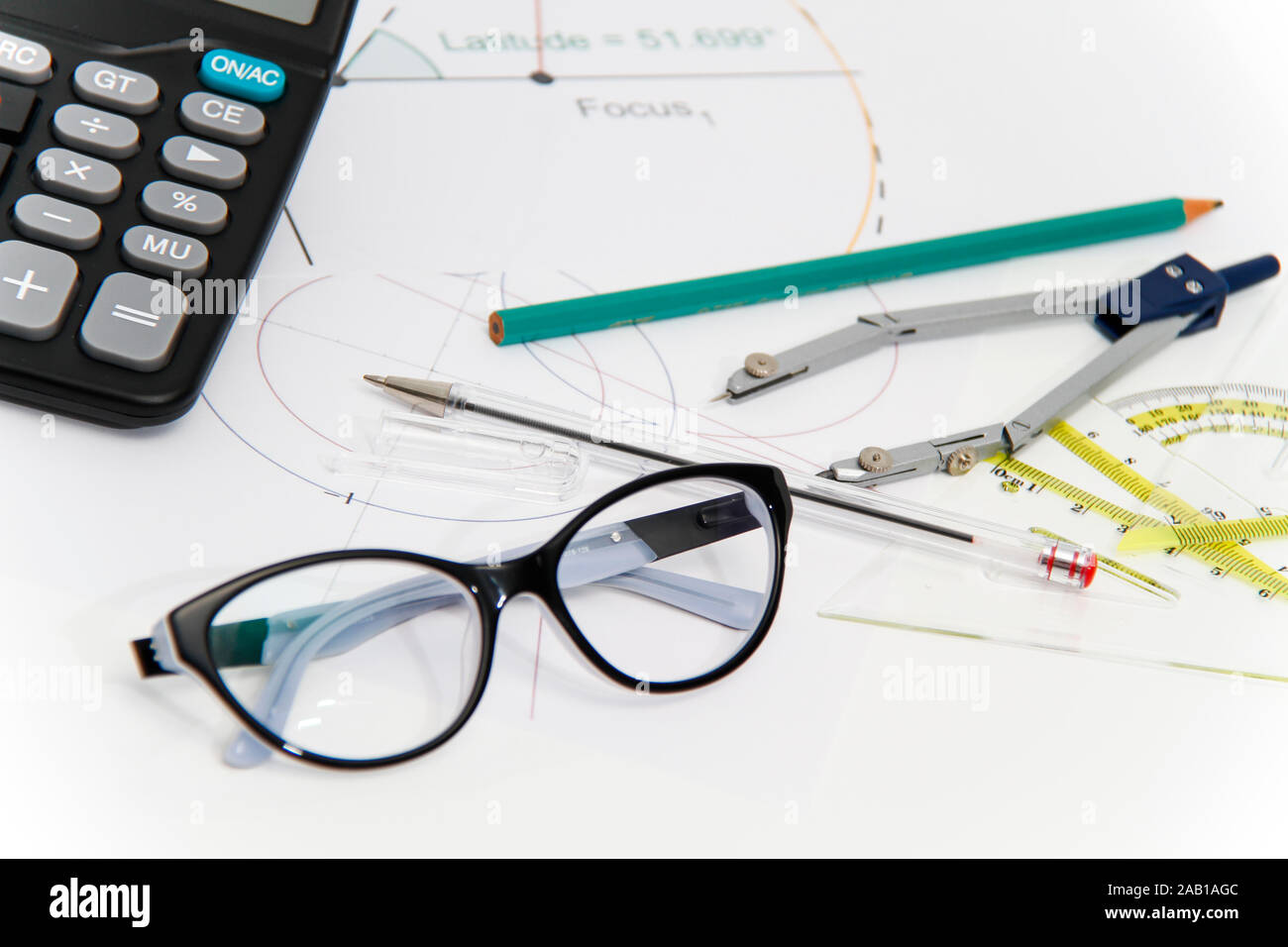 Photo of the Business Architectural project, pair of compasses, glasses ...