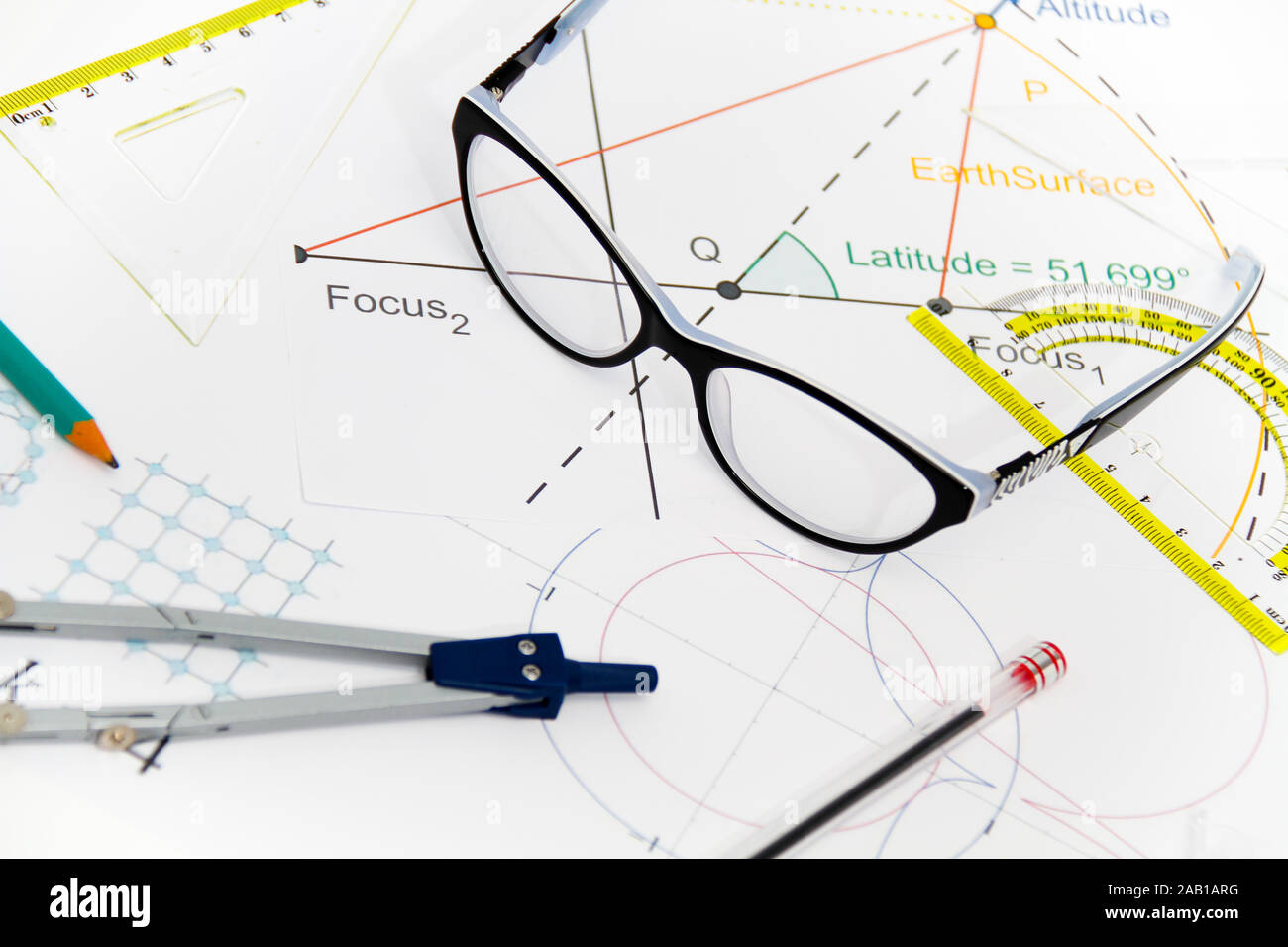 Photo of the Business Architectural project, pair of compasses, glasses ...