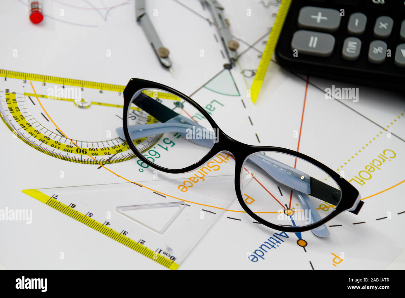 Photo of the Business Architectural project, pair of compasses, glasses ...