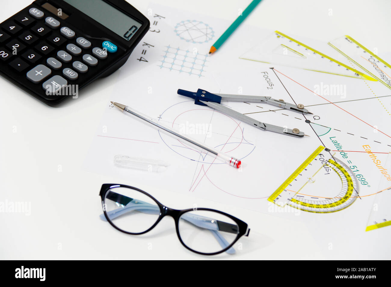 Photo of the Business Architectural project, pair of compasses, glasses ...