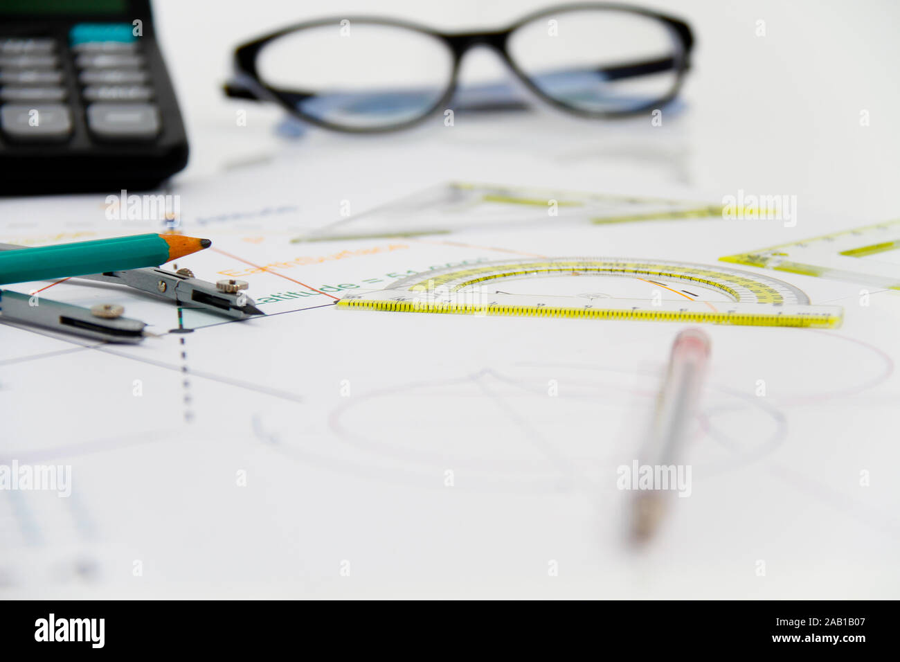 Photo of the Business Architectural project, pair of compasses, glasses ...