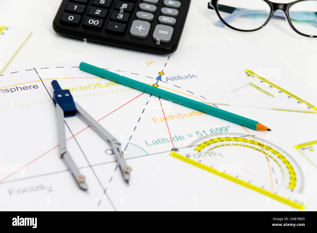Photo of the Business Architectural project, pair of compasses, glasses ...