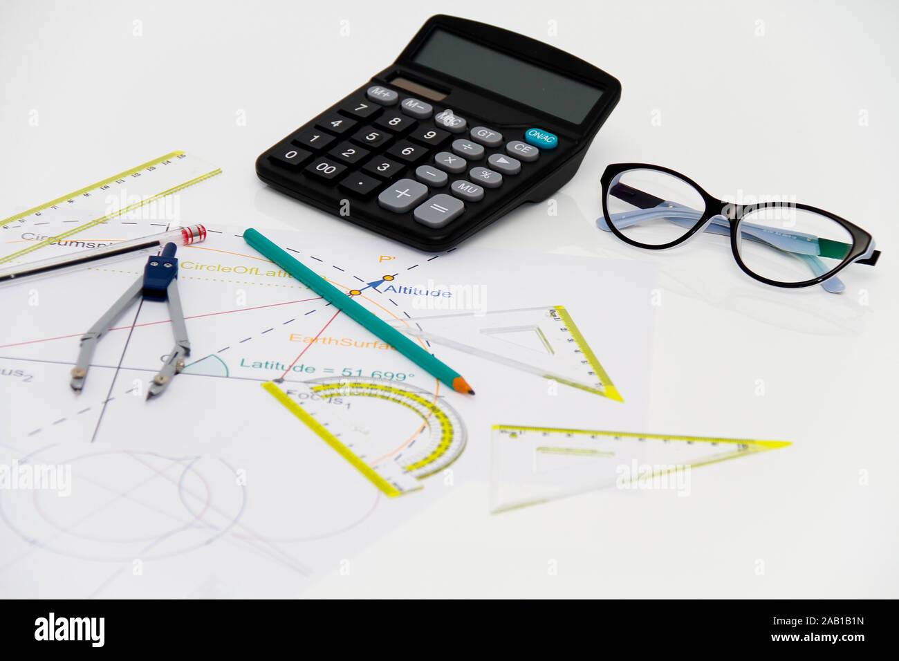 Photo of the Business Architectural project, pair of compasses, glasses ...