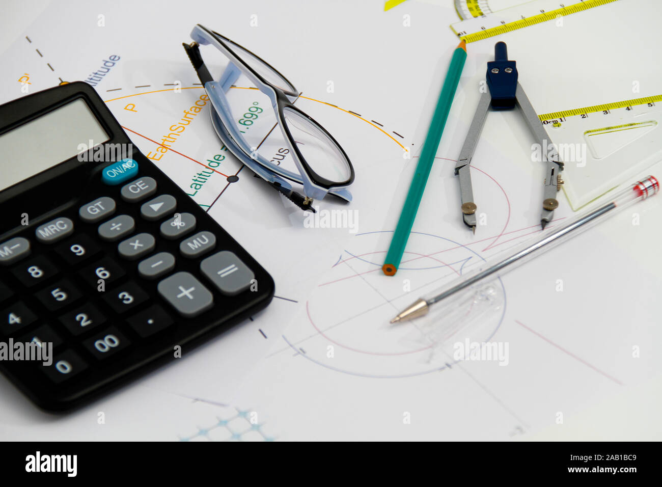 Photo of the Business Architectural project, pair of compasses, glasses ...