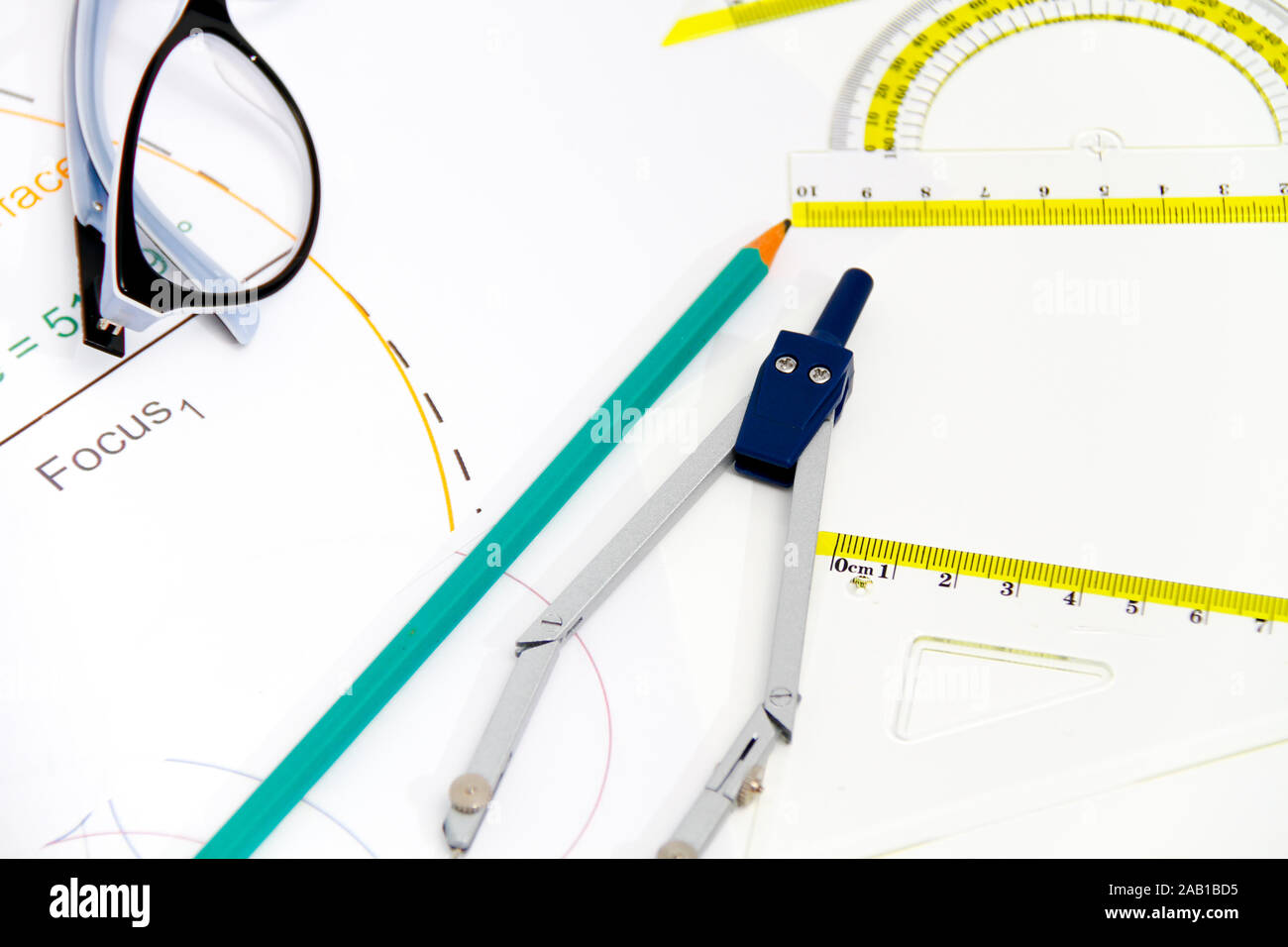 Photo of the Business Architectural project, pair of compasses, glasses ...