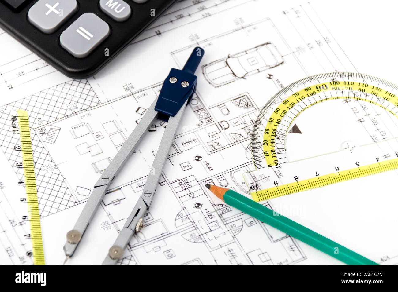 Photo of the Architectural project, pair of compasses, rulers and ...