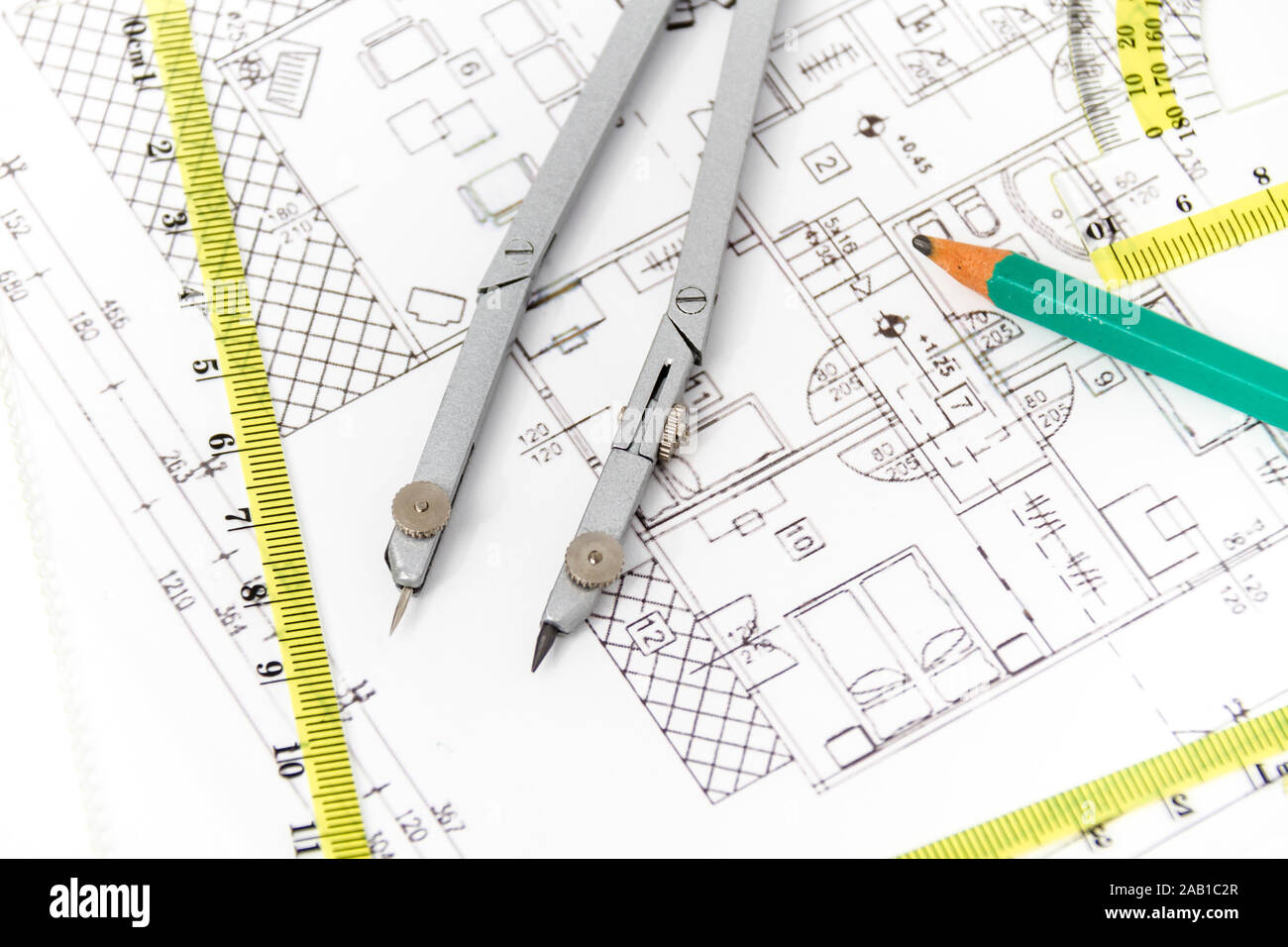 Photo of the Architectural project, pair of compasses, rulers and ...