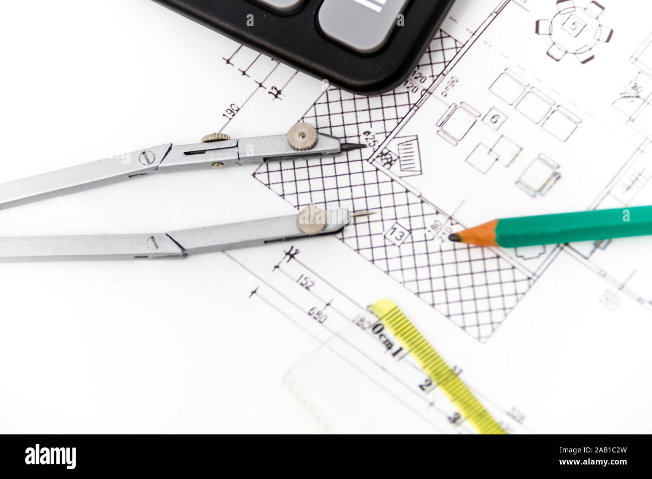Photo of the Architectural project, pair of compasses, rulers and ...