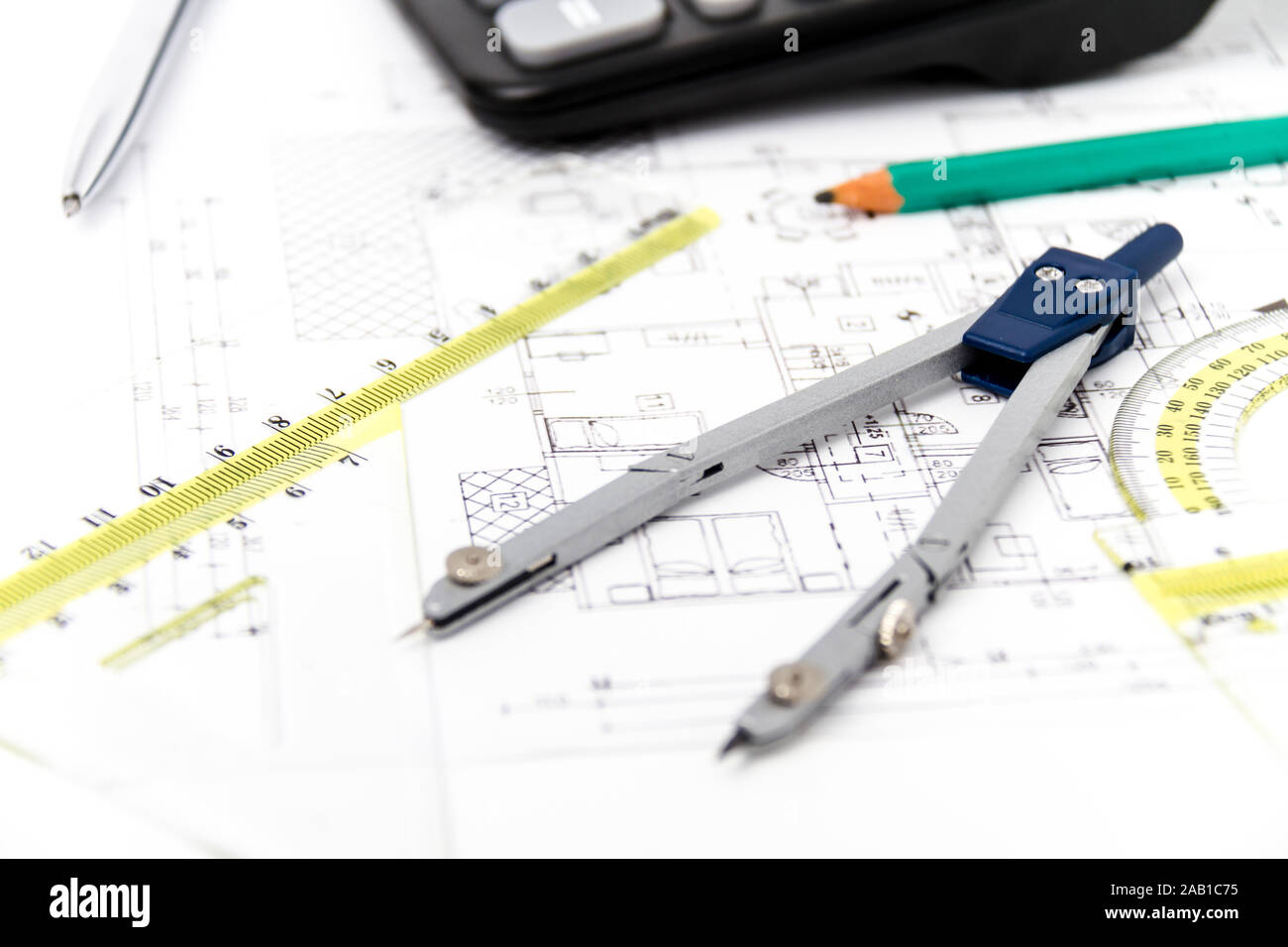 Photo of the Architectural project, pair of compasses, rulers and ...