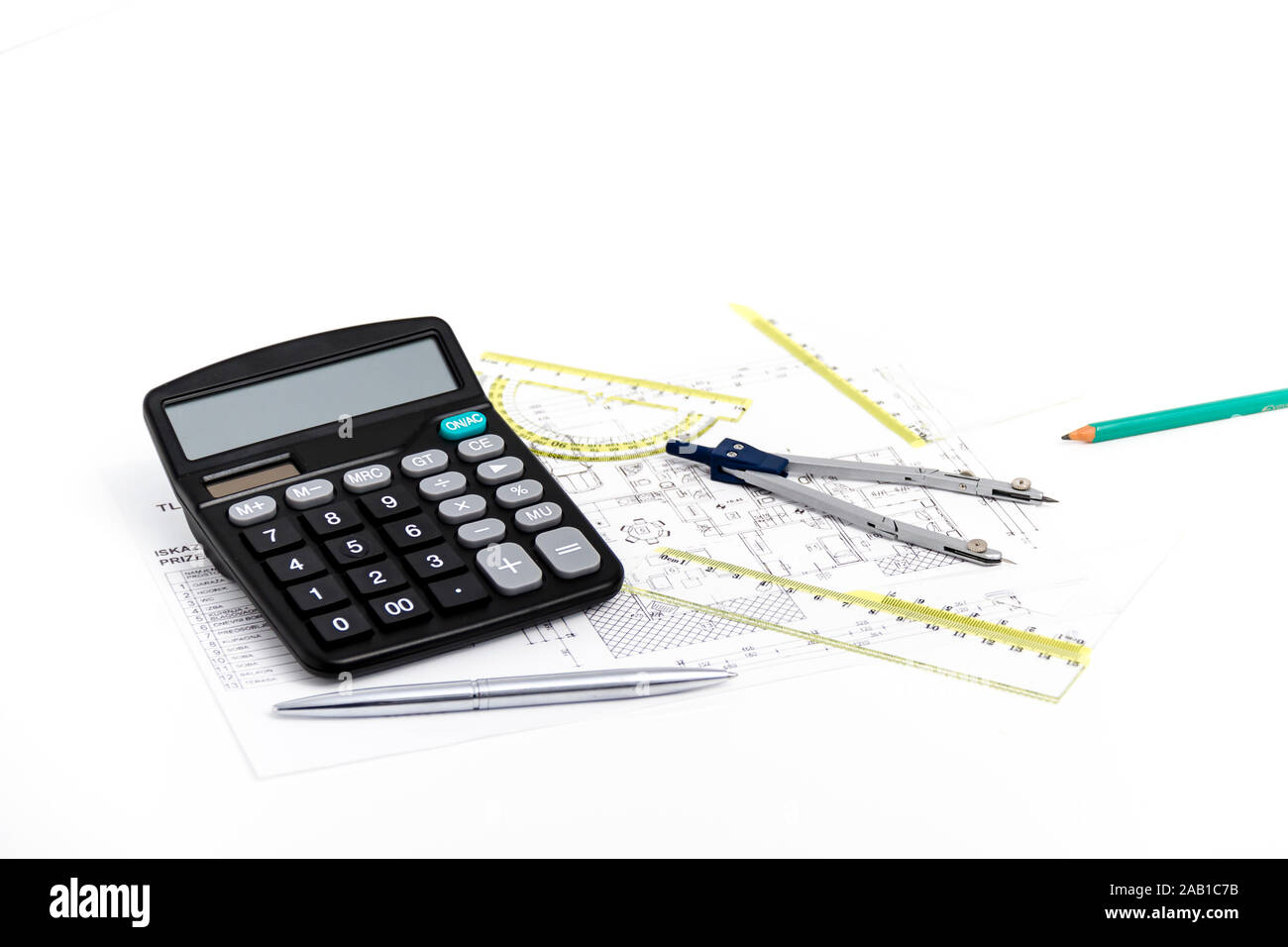 Photo of the Architectural project, pair of compasses, rulers and ...