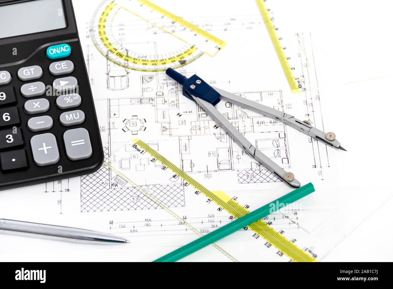 Photo of the Architectural project, pair of compasses, rulers and ...