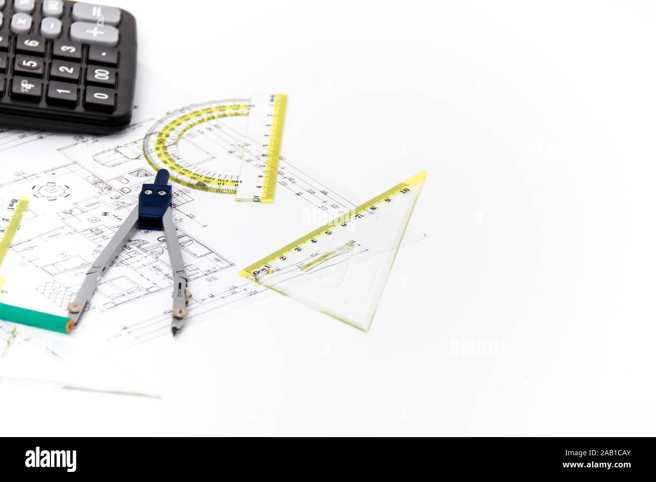 Photo of the Architectural project, pair of compasses, rulers and ...