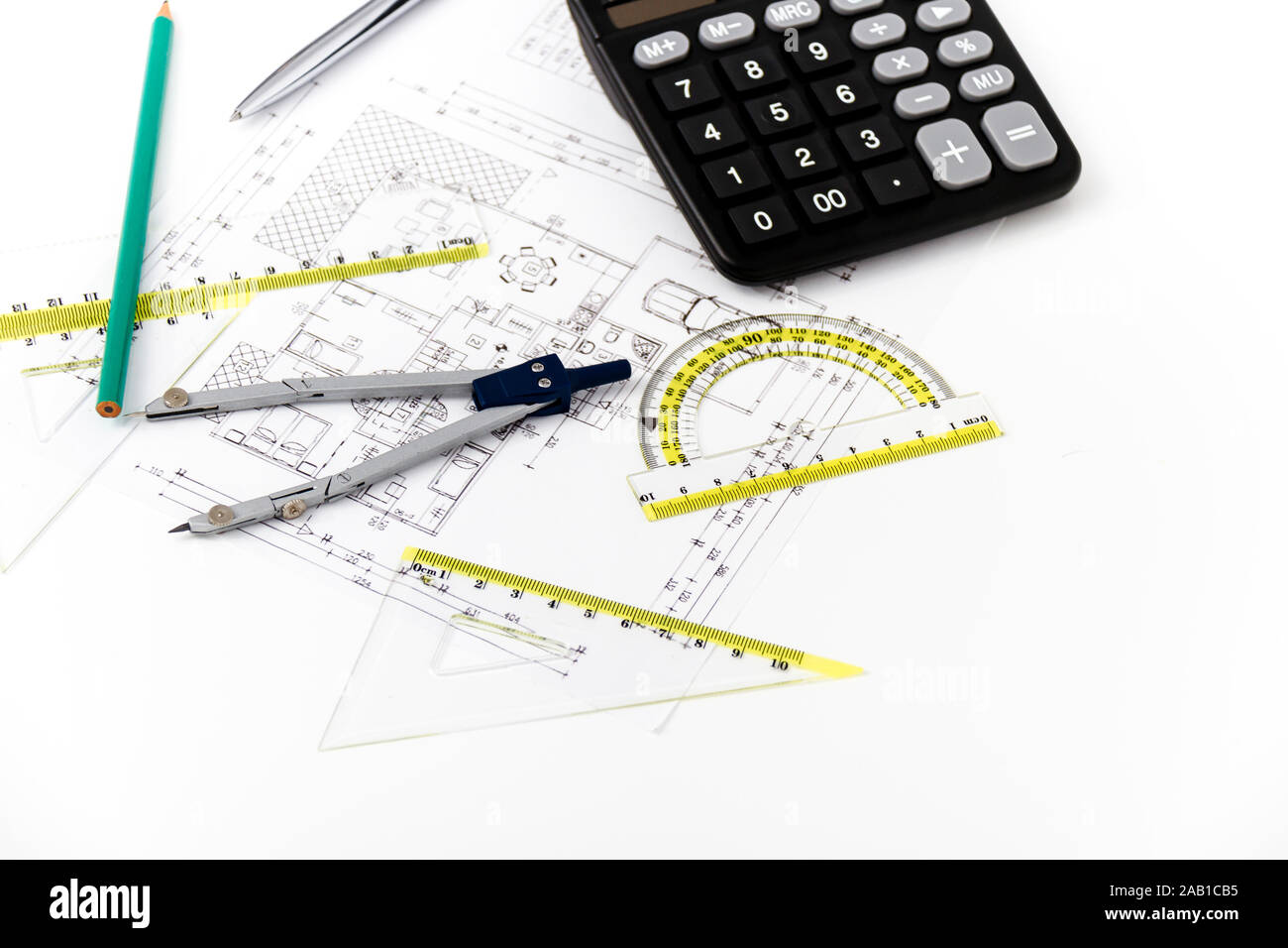 Photo of the Architectural project, pair of compasses, rulers and ...