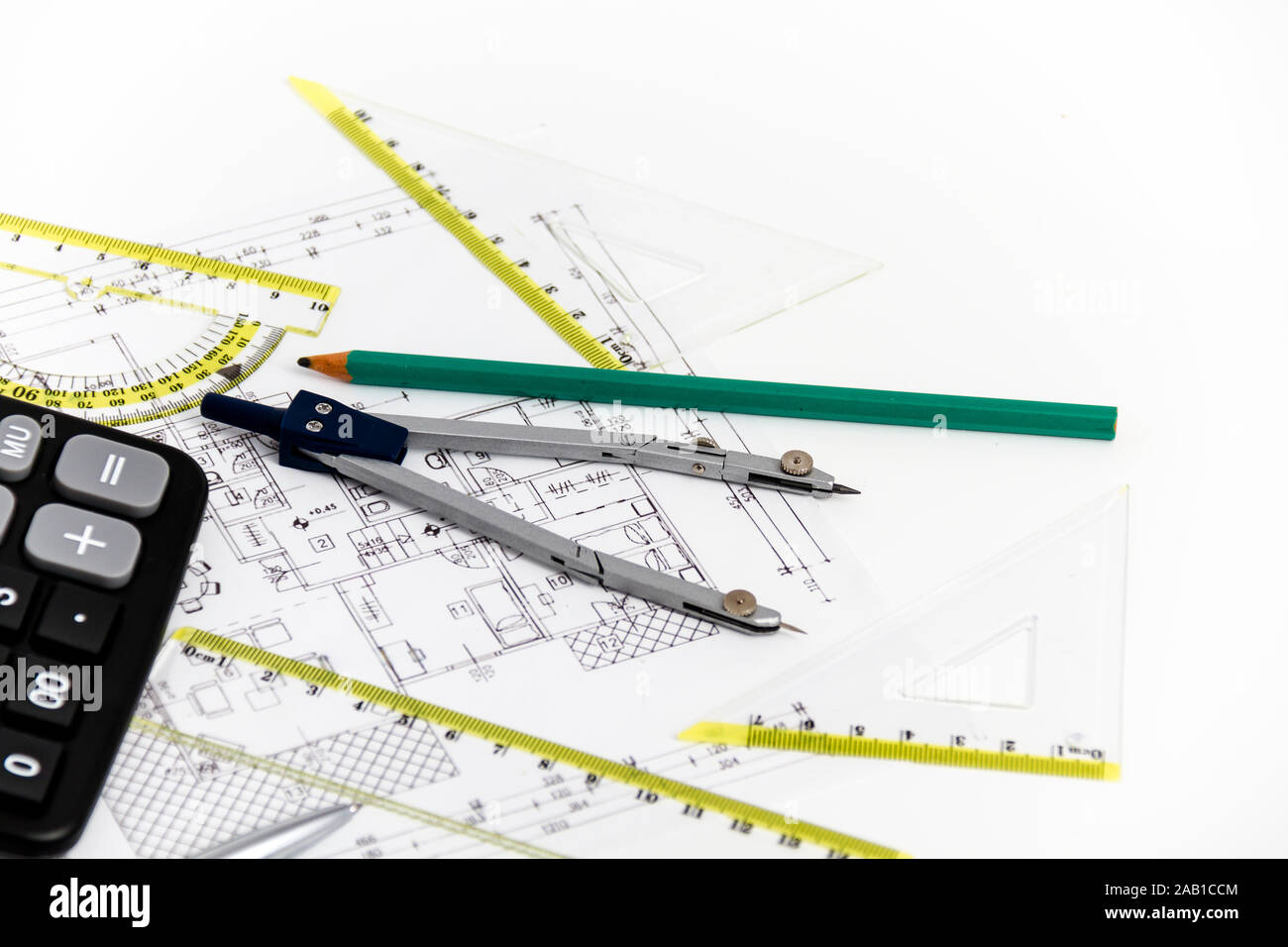 Photo of the Architectural project, pair of compasses, rulers and ...