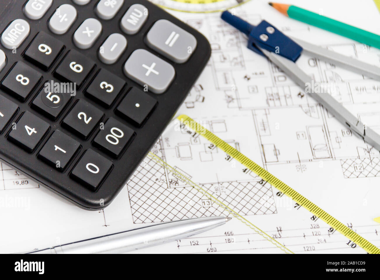 Photo of the Architectural project, pair of compasses, rulers and ...