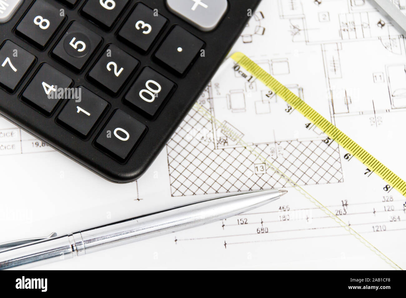 Photo of the Architectural project, pair of compasses, rulers and ...