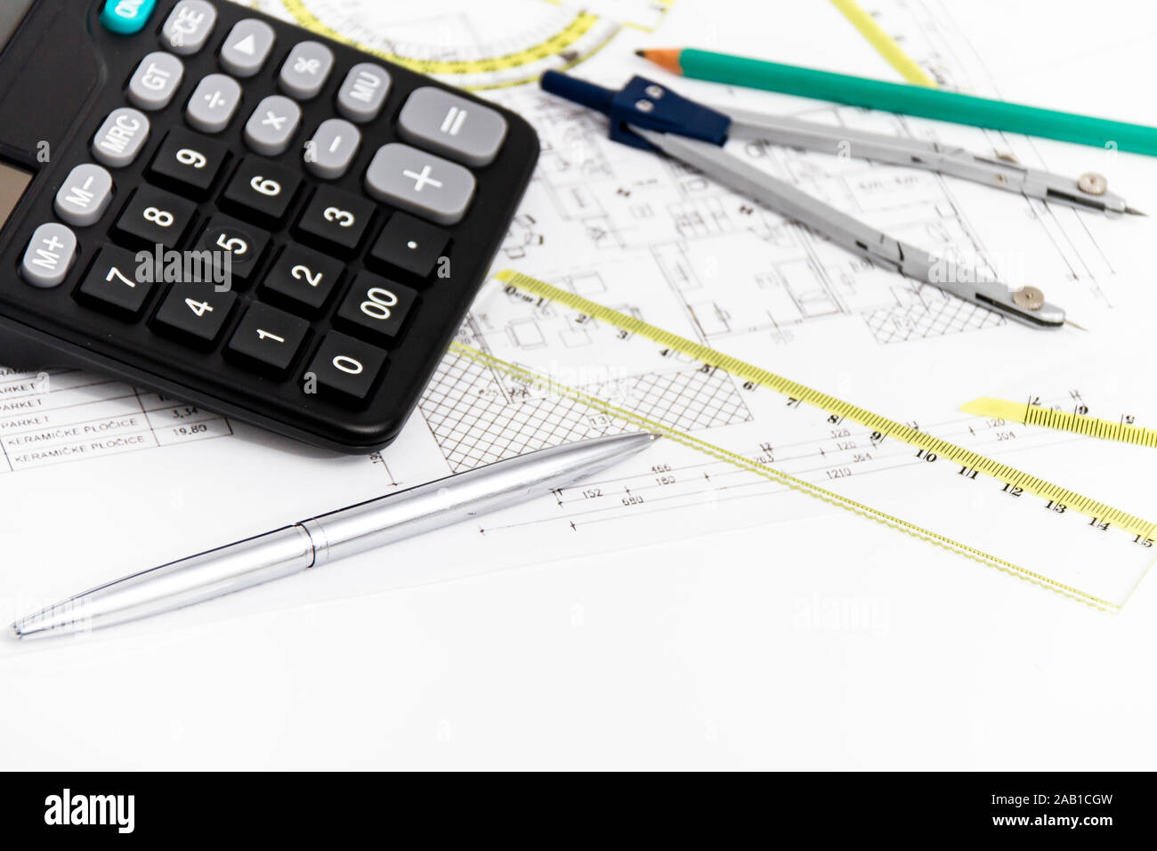 Photo of the Architectural project, pair of compasses, rulers and ...