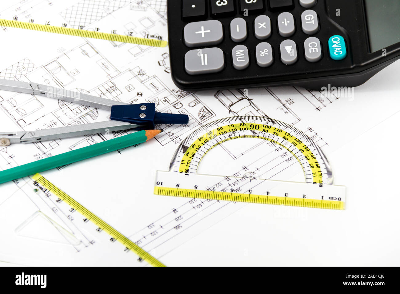 Photo of the Architectural project, pair of compasses, rulers and ...