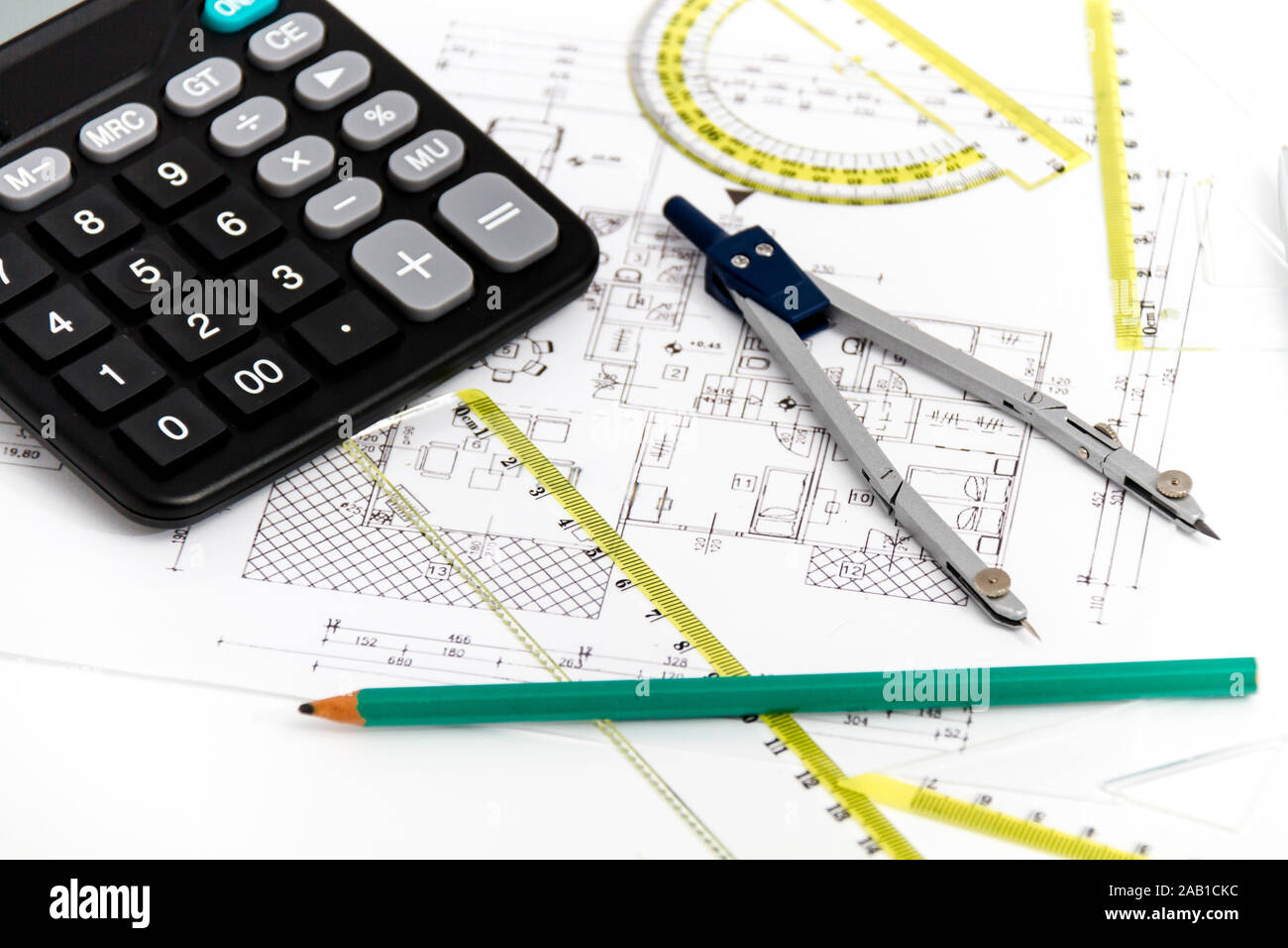 Photo of the Architectural project, pair of compasses, rulers and ...