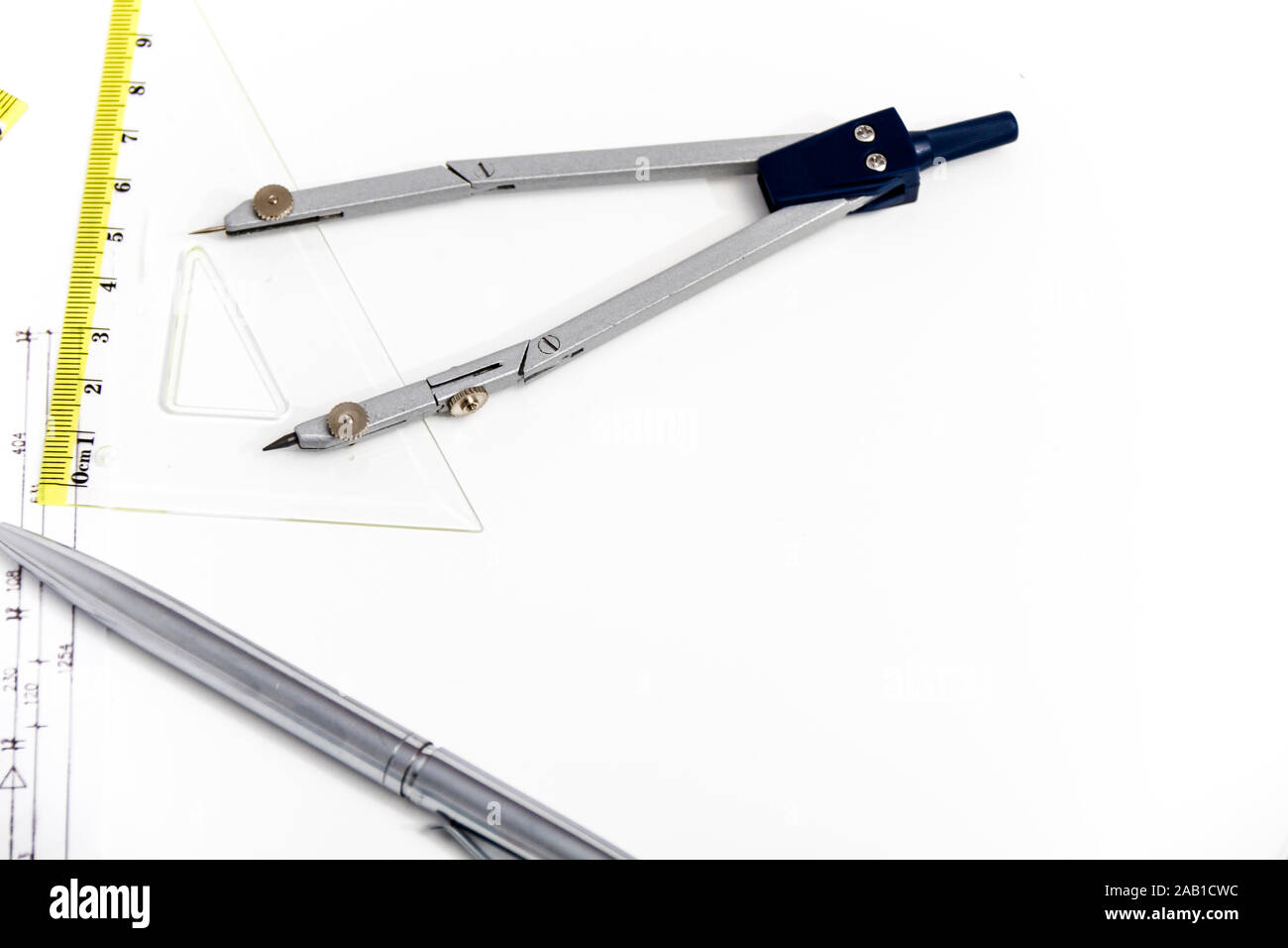 Photo of the Architectural project, pair of compasses, rulers and calculator Stock Photo - Alamy