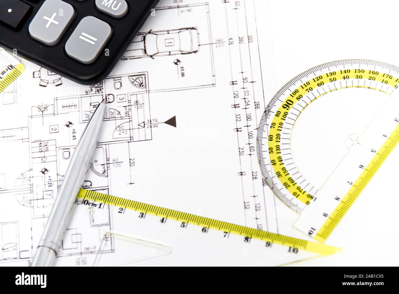 Photo of the Architectural project, pair of compasses, rulers and ...