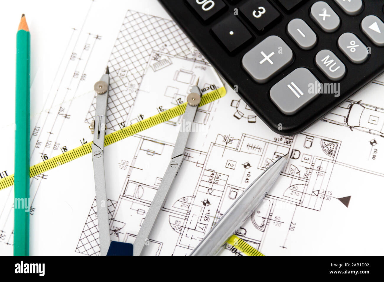 Photo of the Architectural project, pair of compasses, rulers and ...