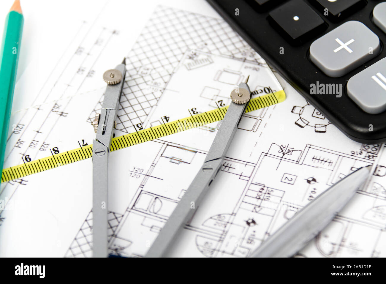 Photo of the Architectural project, pair of compasses, rulers and ...
