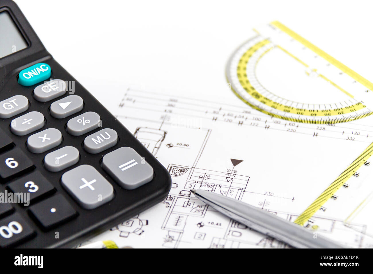 Photo of the Architectural project, pair of compasses, rulers and ...