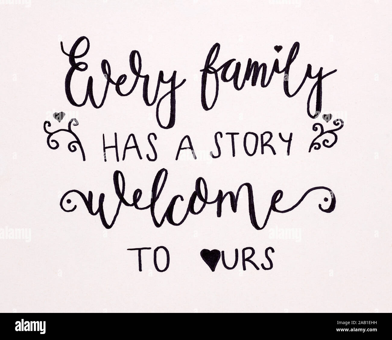 Every family has a story welcome to ours hand calligraphy isolated on ...