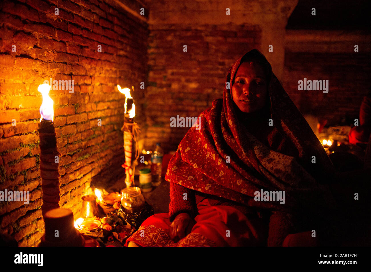 Kathmandu, Nepal. 25th Nov, 2019. A devotee performs a ritual at the ...