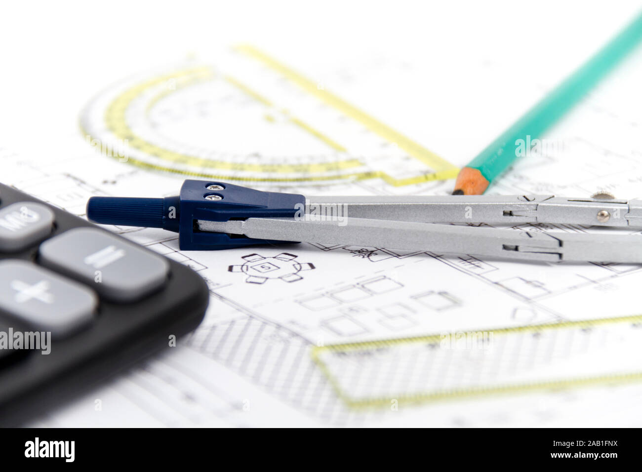 Photo of the Architectural project, pair of compasses, rulers and ...