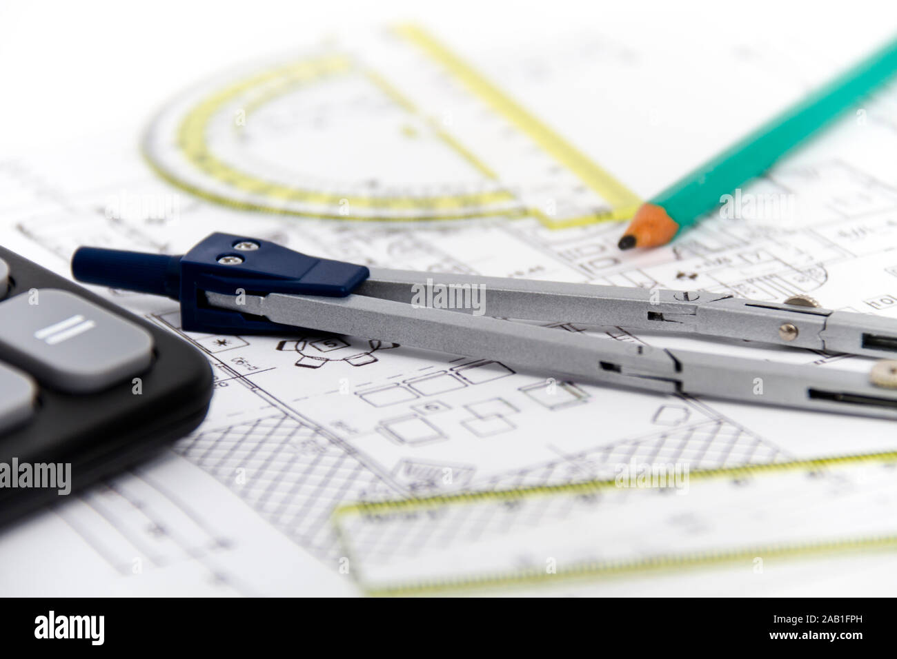 Photo of the Architectural project, pair of compasses, rulers and ...