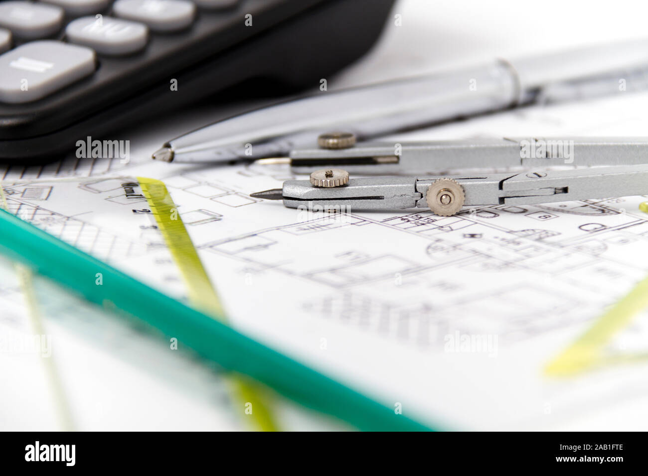 Photo of the Architectural project, pair of compasses, rulers and ...