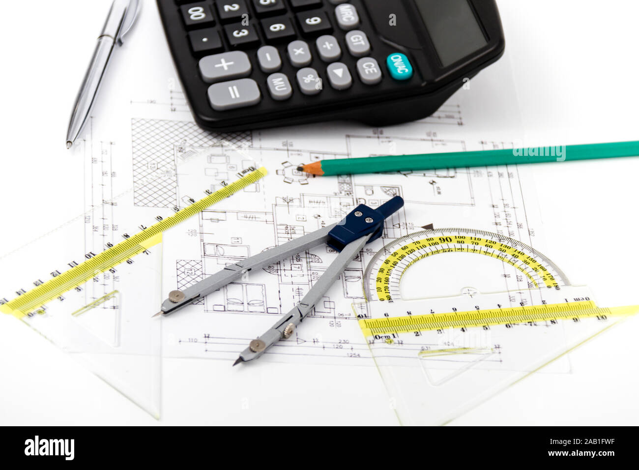 Photo of the Architectural project, pair of compasses, rulers and ...