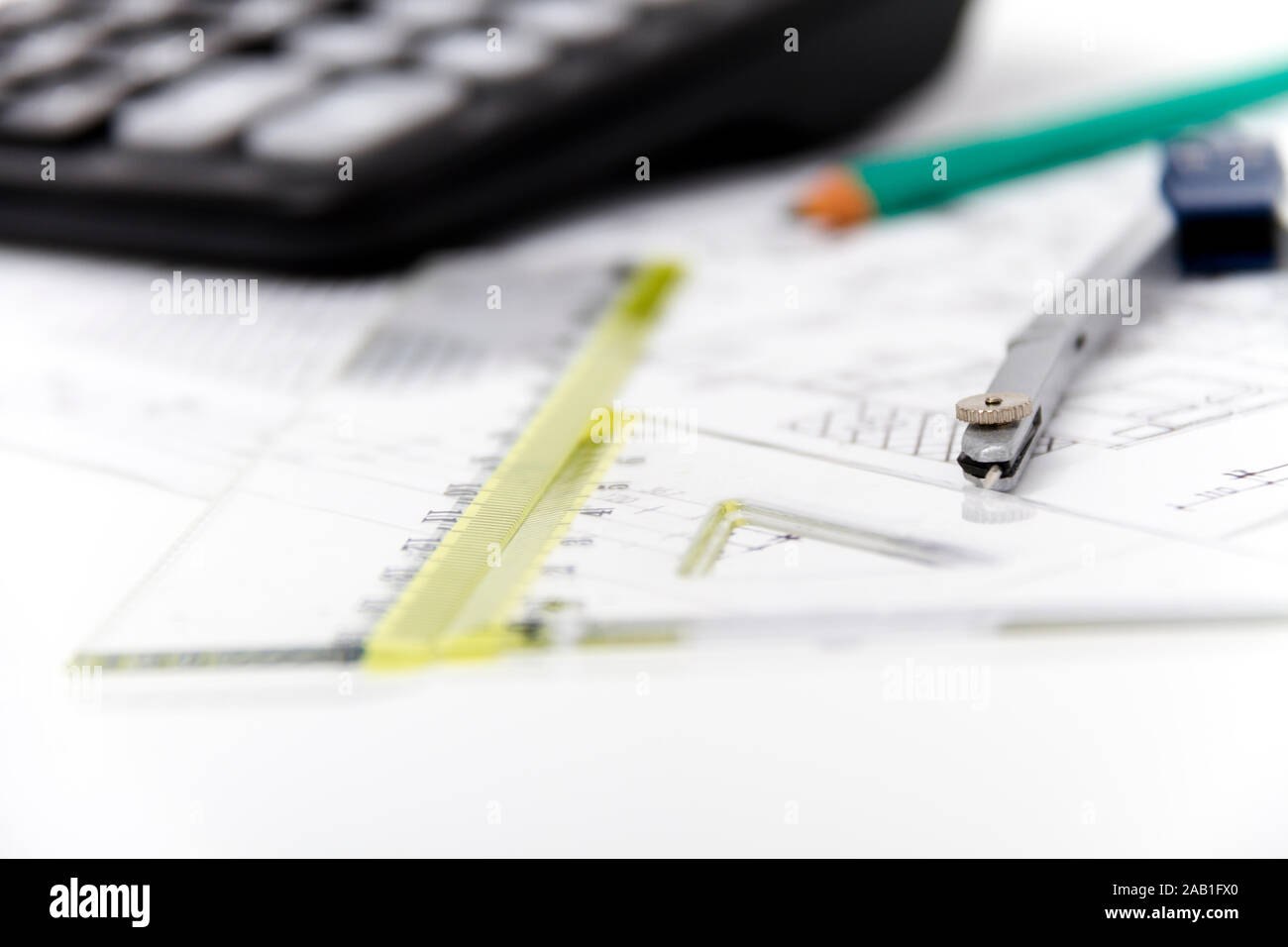 Photo of the Architectural project, pair of compasses, rulers and ...