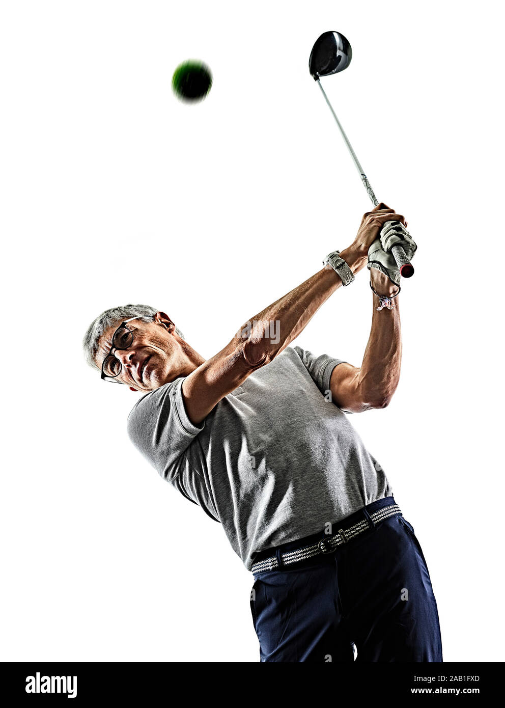 one caucasian senior man golfer golfing in studio shadow silhouette ...