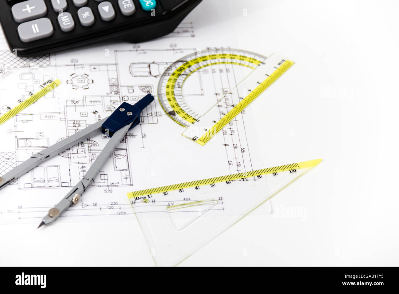 Photo of the Architectural project, pair of compasses, rulers and ...
