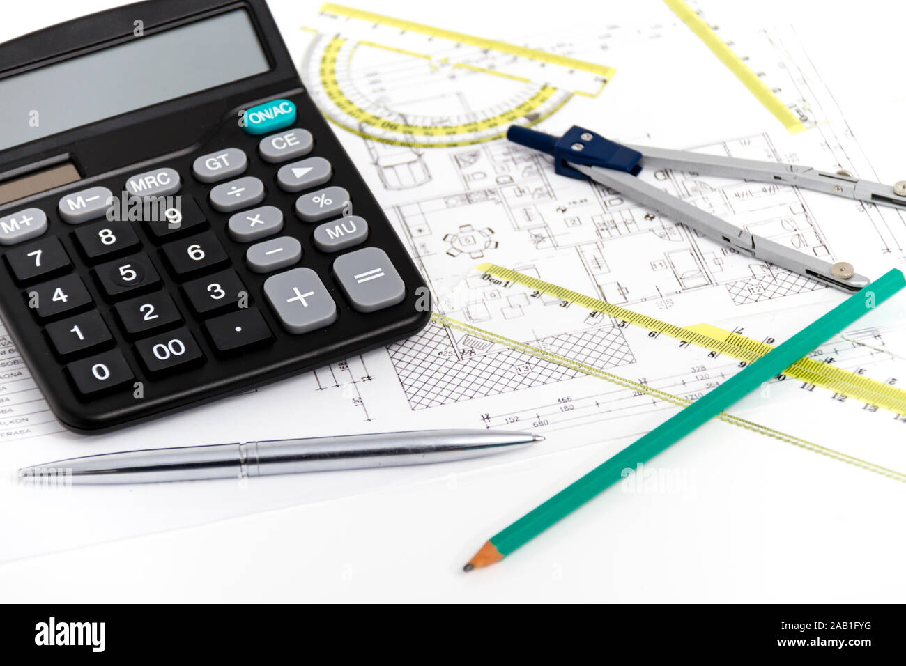 Photo of the Architectural project, pair of compasses, rulers and ...