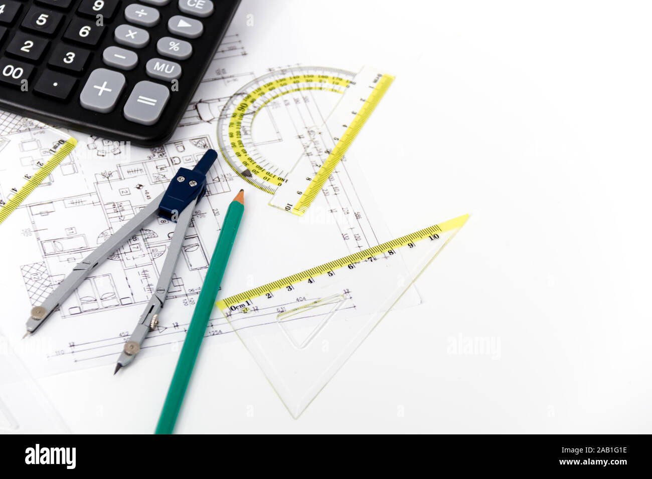 Photo of the Architectural project, pair of compasses, rulers and ...