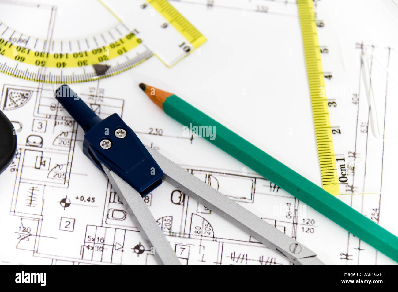 Photo of the Architectural project, pair of compasses, rulers and ...